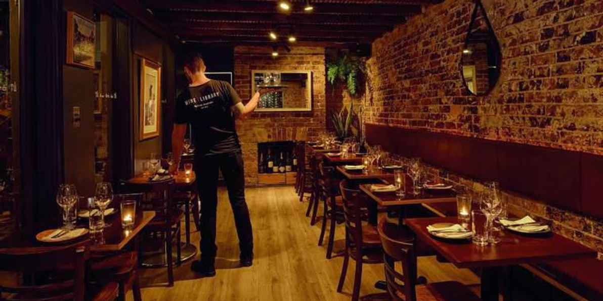 Wine Library: 50% off the first table of the night with First Table