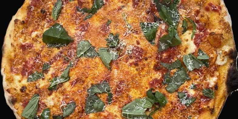 GiGi's Pizza: 50% off the first table of the night with First Table